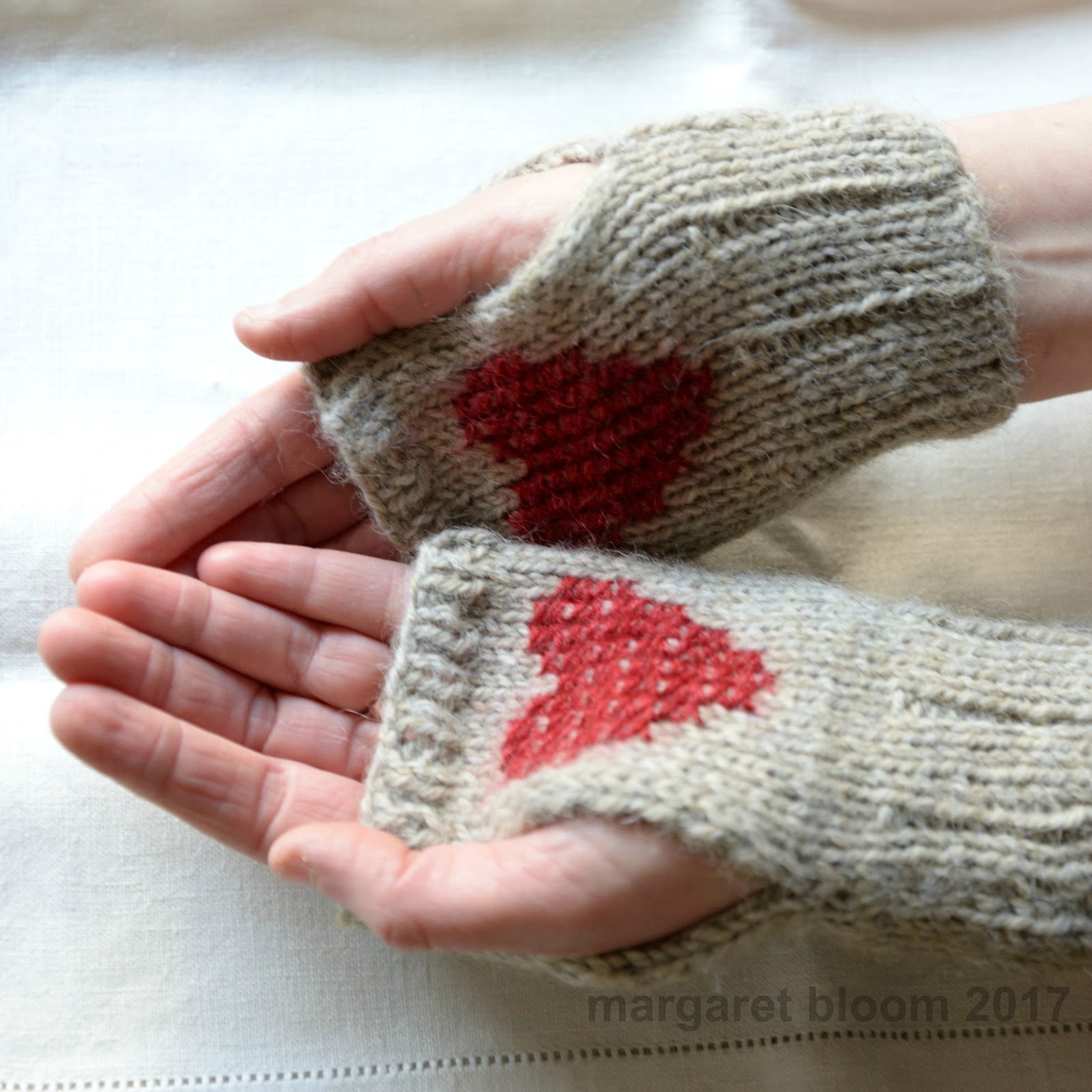 we bloom here: i carry your heart mitts :: knitting pattern