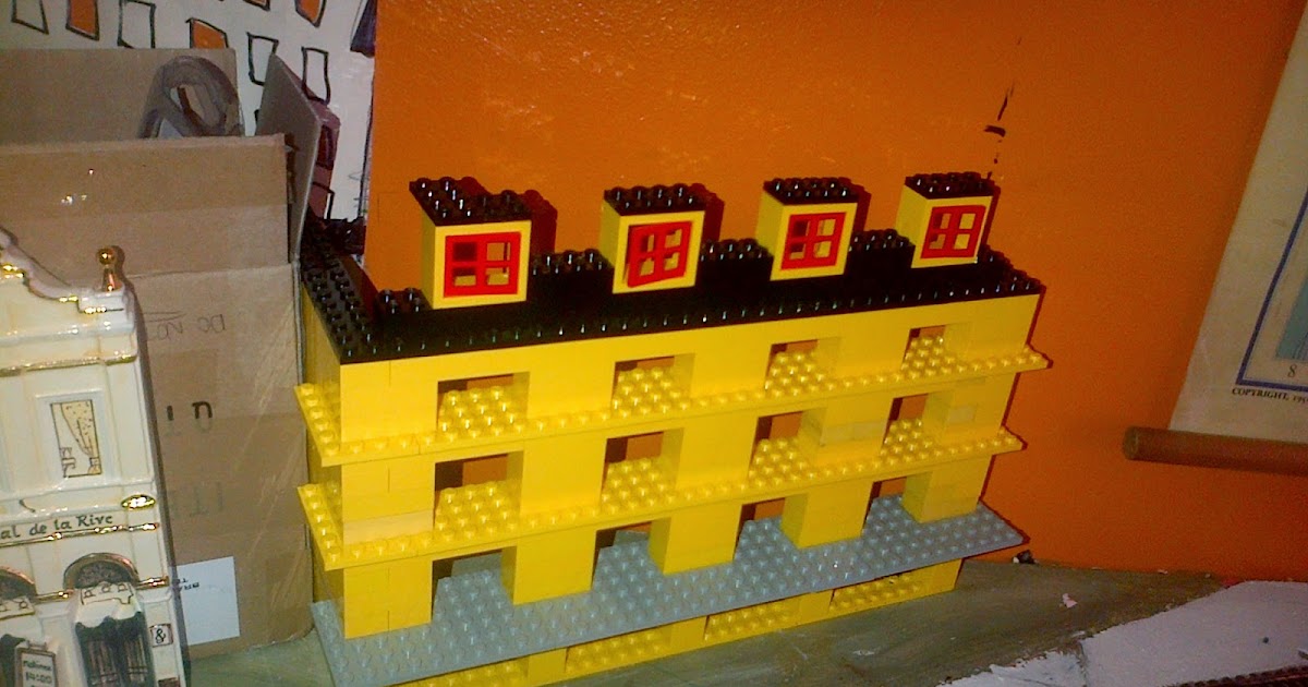 French Model Railway: Painting window frames on Lego bricks.