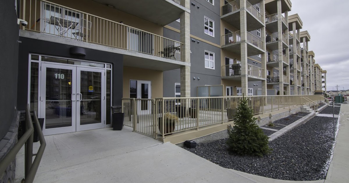 **STUNNING Elevated Main Floor Condo, Massive Balcony