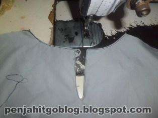 cara menjahit bukaan kancing sengkelit pada kerung leher baju