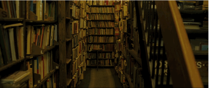 Books Falling Off Shelf Gif