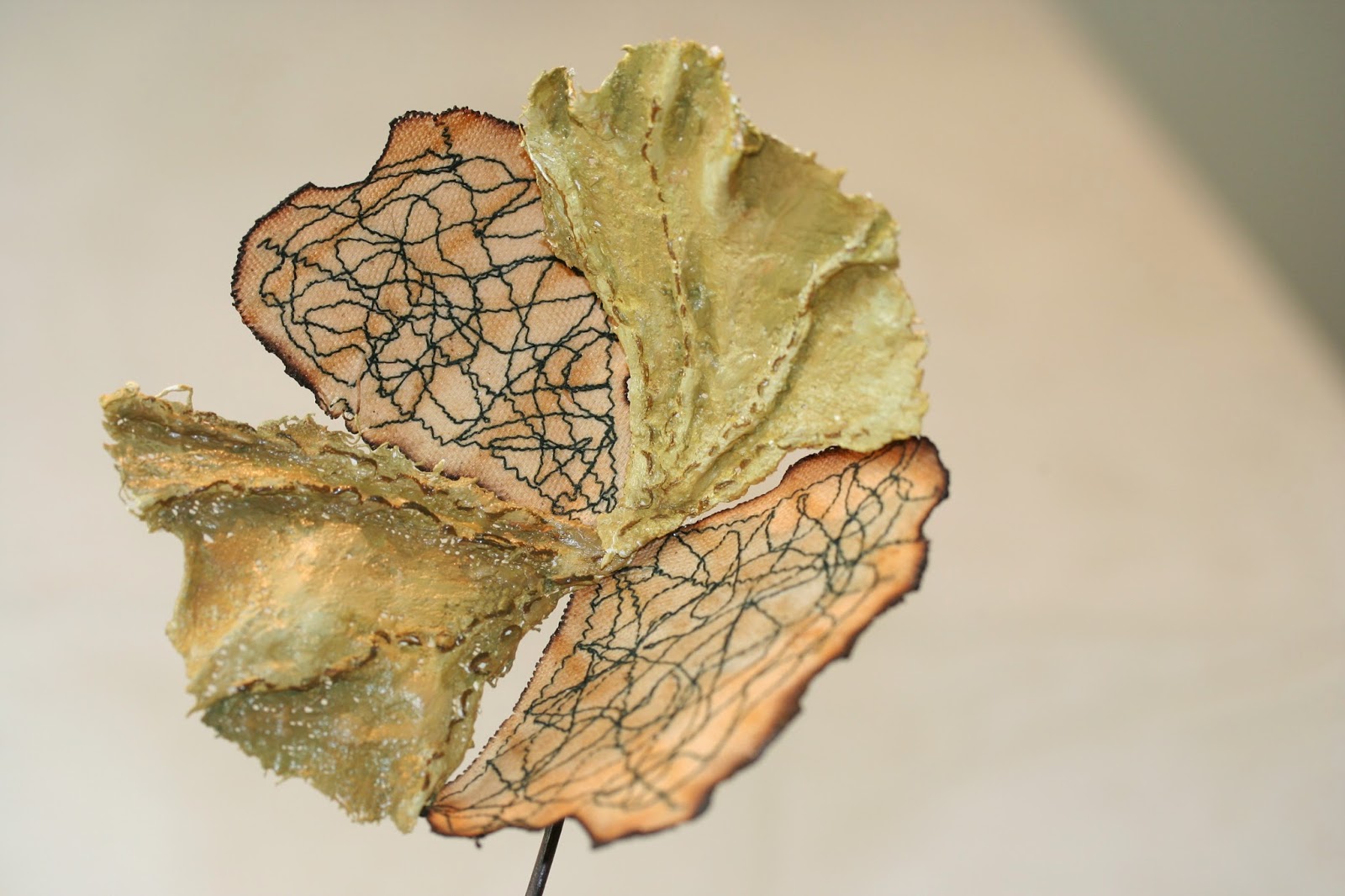 Silver Bells and Cockle Shells: Modroc sculpture of dying flower