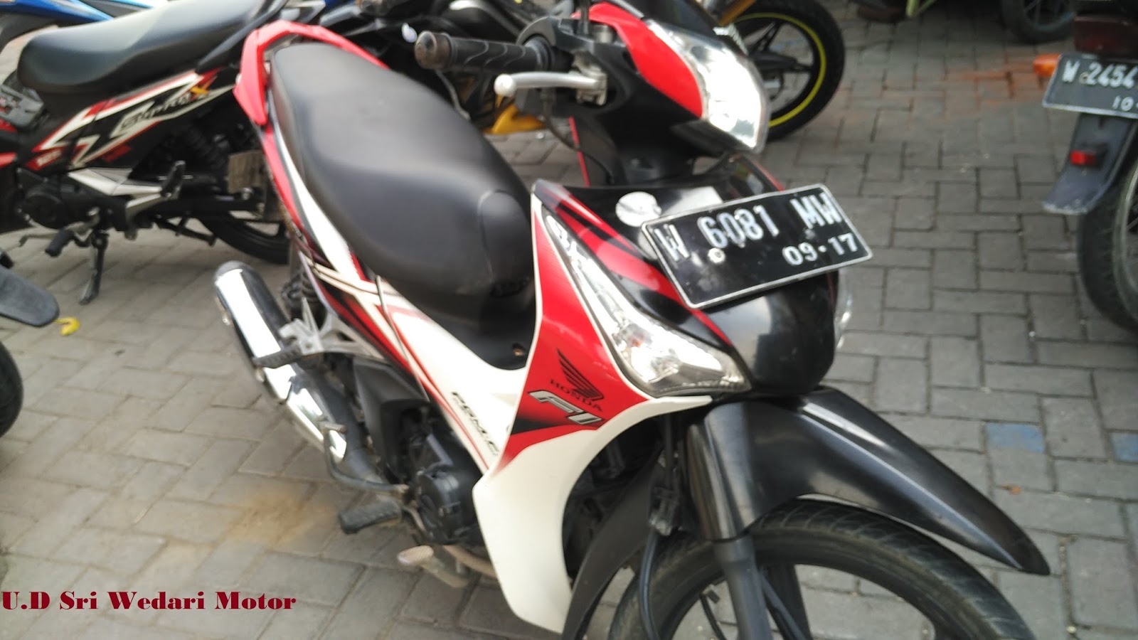 Supra X125 Injection - Helm In - U.D Sri Wedari Motor