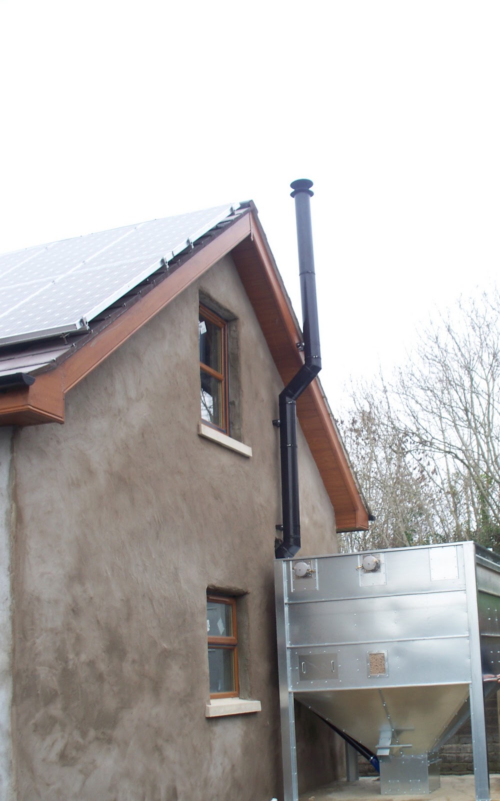 Green Energy Technology: Wood Pellet Heating & Solar Photovoltaic ...