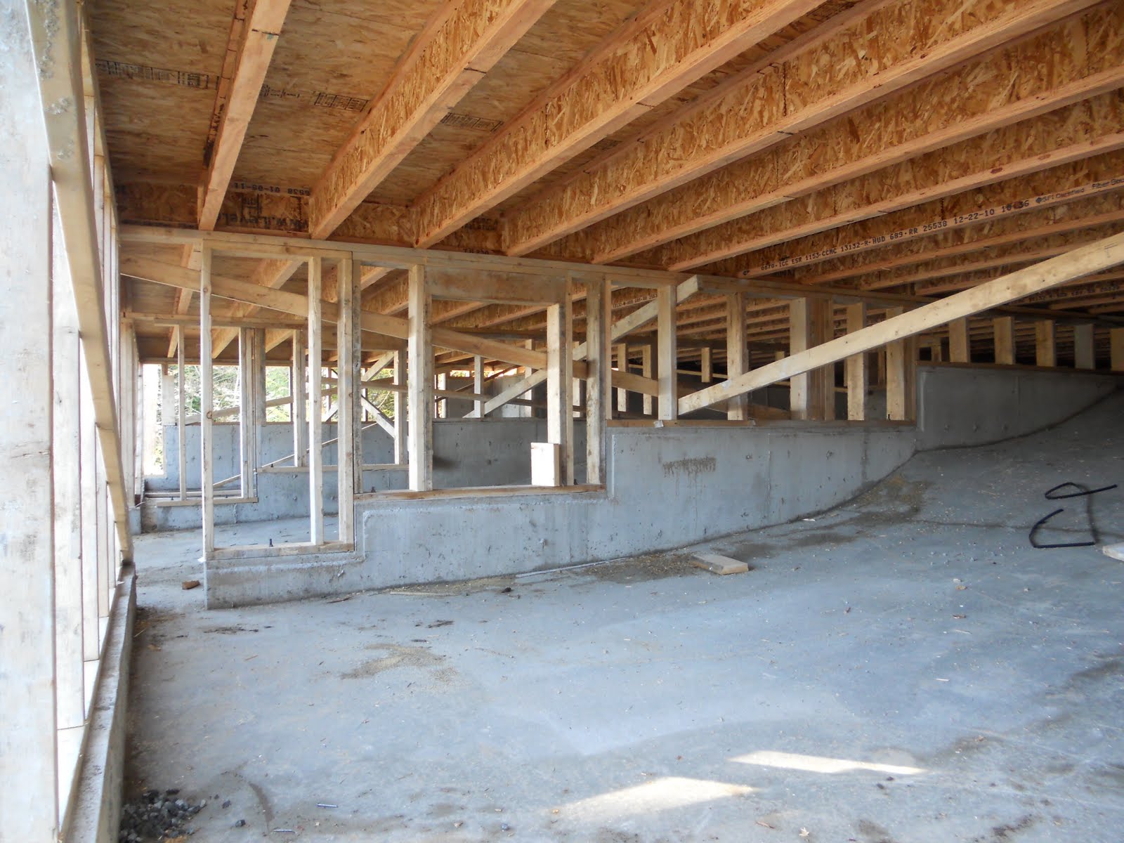 Butterfly House: March 31st - Framing crawl space & sheathing first floor