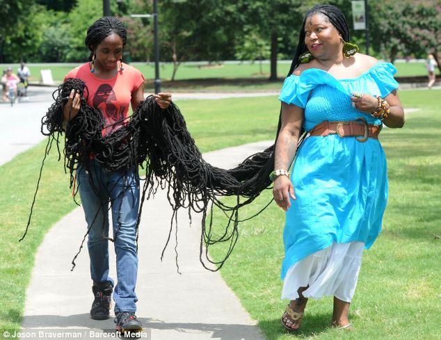 Meet Asha Mandela: the woman with the longest dreadlocks in the world