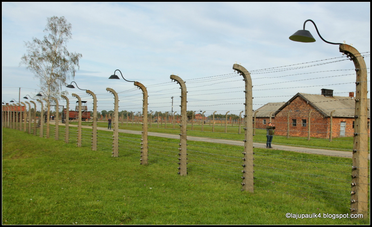 Through the Lands of Holocaust: Barbed wire electric fences and guard ...