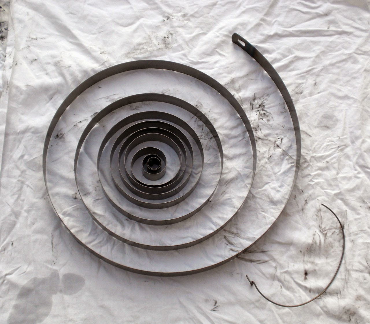 Backspace does not erase: Unpacking a new mainspring