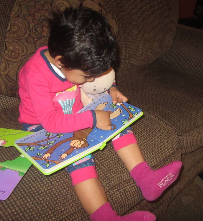 Maya Puri: Reading to Baby Doll
