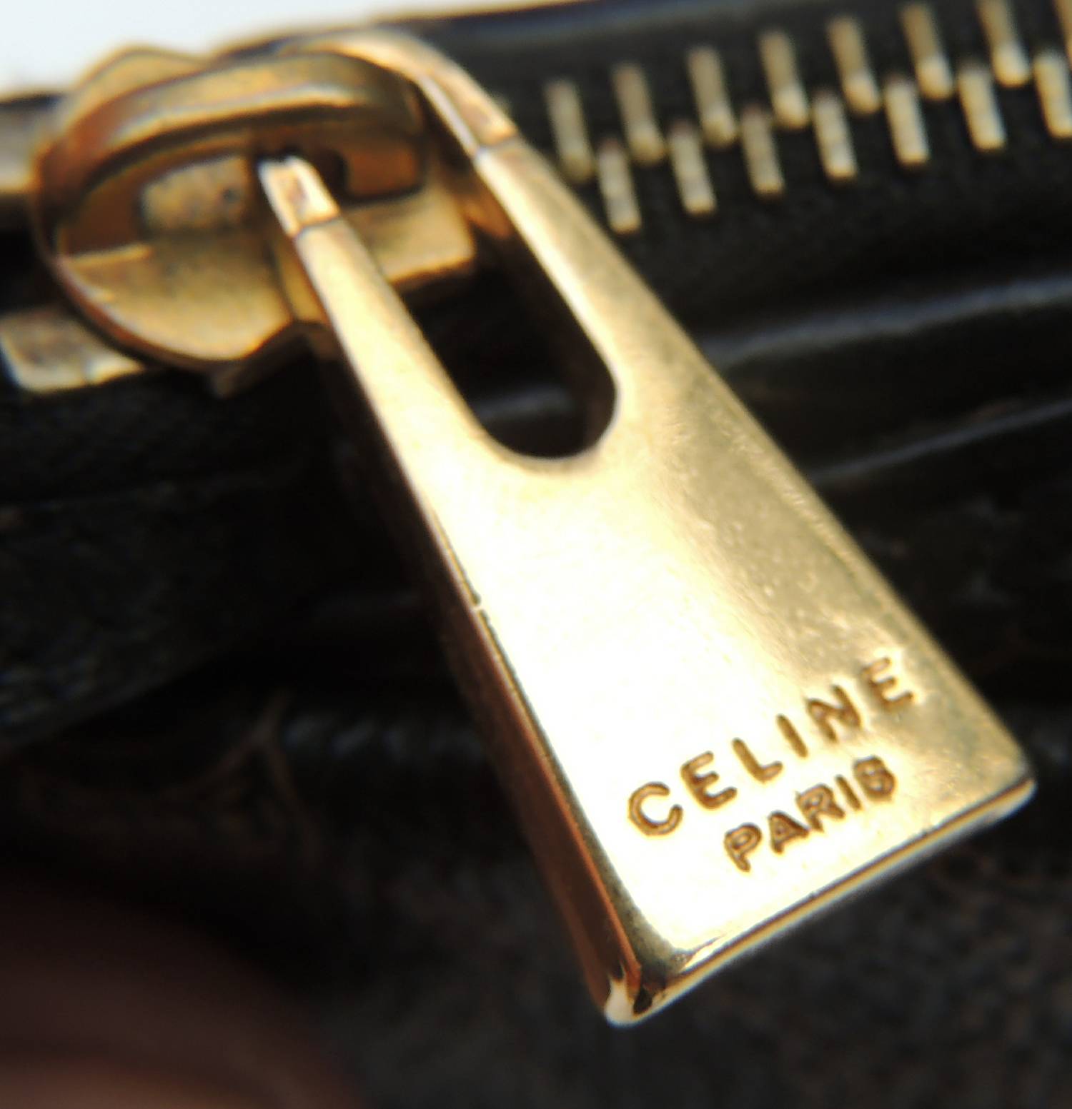 Janji Laku: Authentic CELINE Zipper Clutch