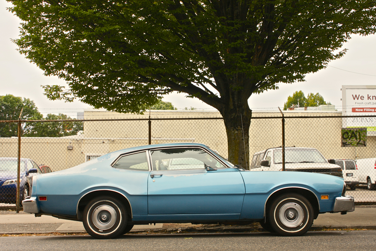 OLD PARKED CARS.: 1976 Ford Maverick.