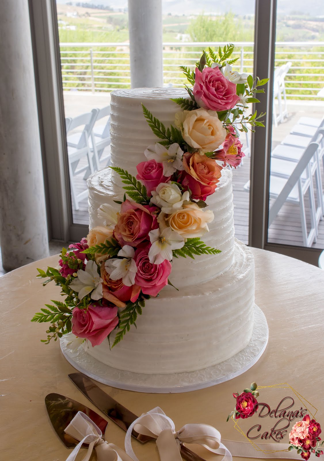 Delana's Cakes: Textured iced and flowers wedding cake at Landtscap