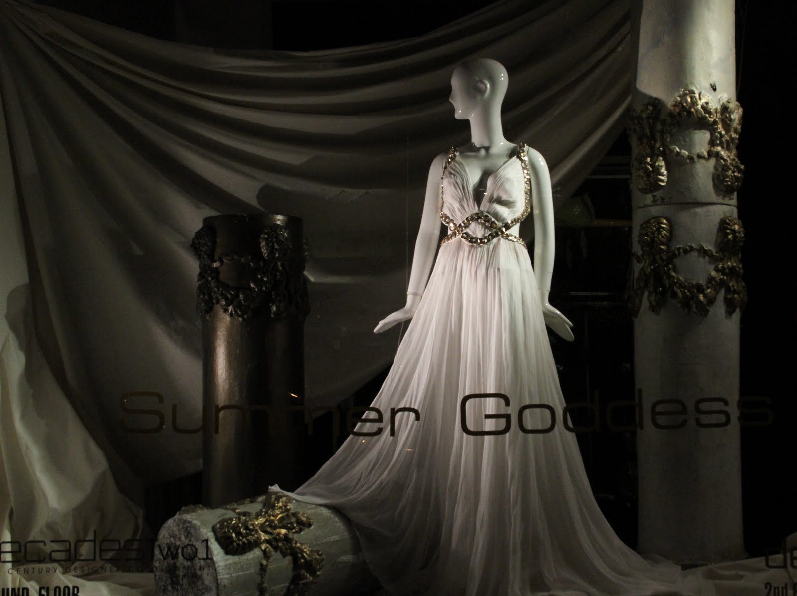 DECADES INC.: STAVROPOULOS and a SUMMER GODDESS