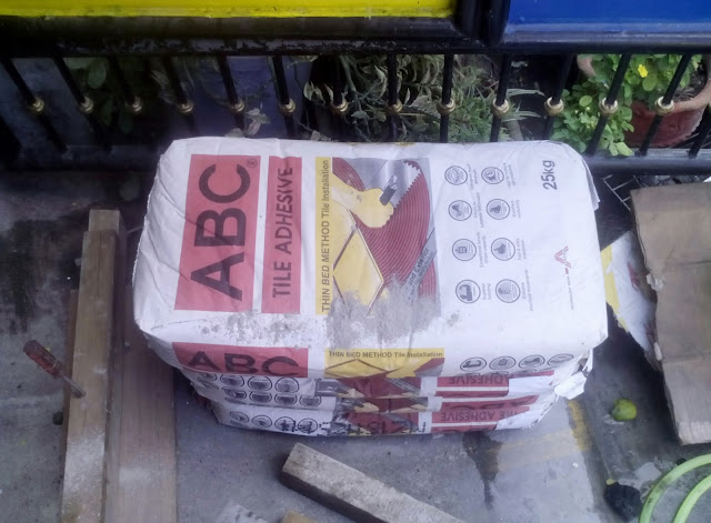 BUILDER'S JOURNAL: TILE INSTALLATION: CONCRETE DRY PACK METHOD