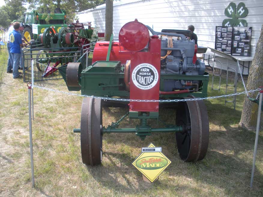 Taken For Granted: 1917 Dain Hay Press and 1915 Farm Horse Tractor