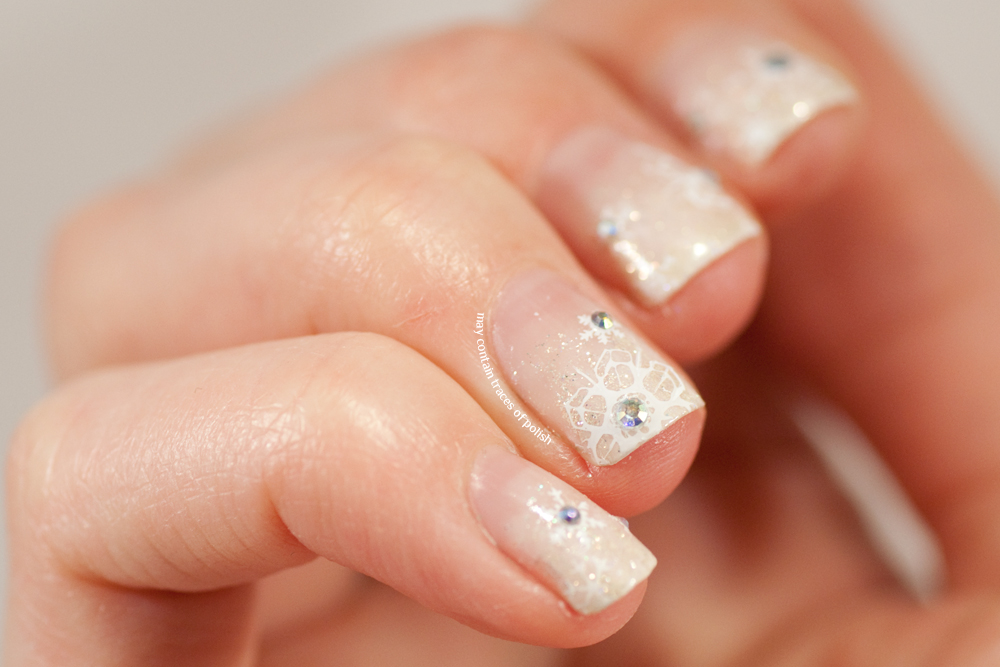 Discreet Snowflake Nail Art - May contain traces of polish