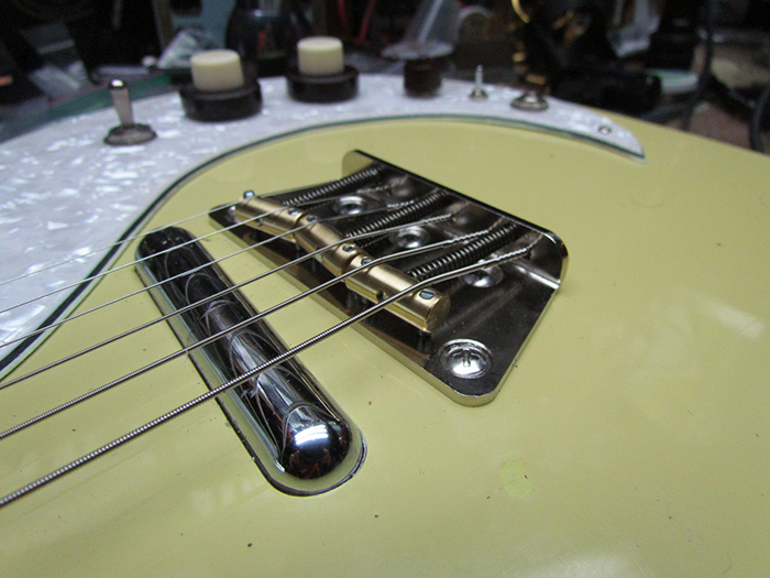CJ Guitar Tooling Bridge on Danelectro DC-2 Crawls Backward (When Alarmed)