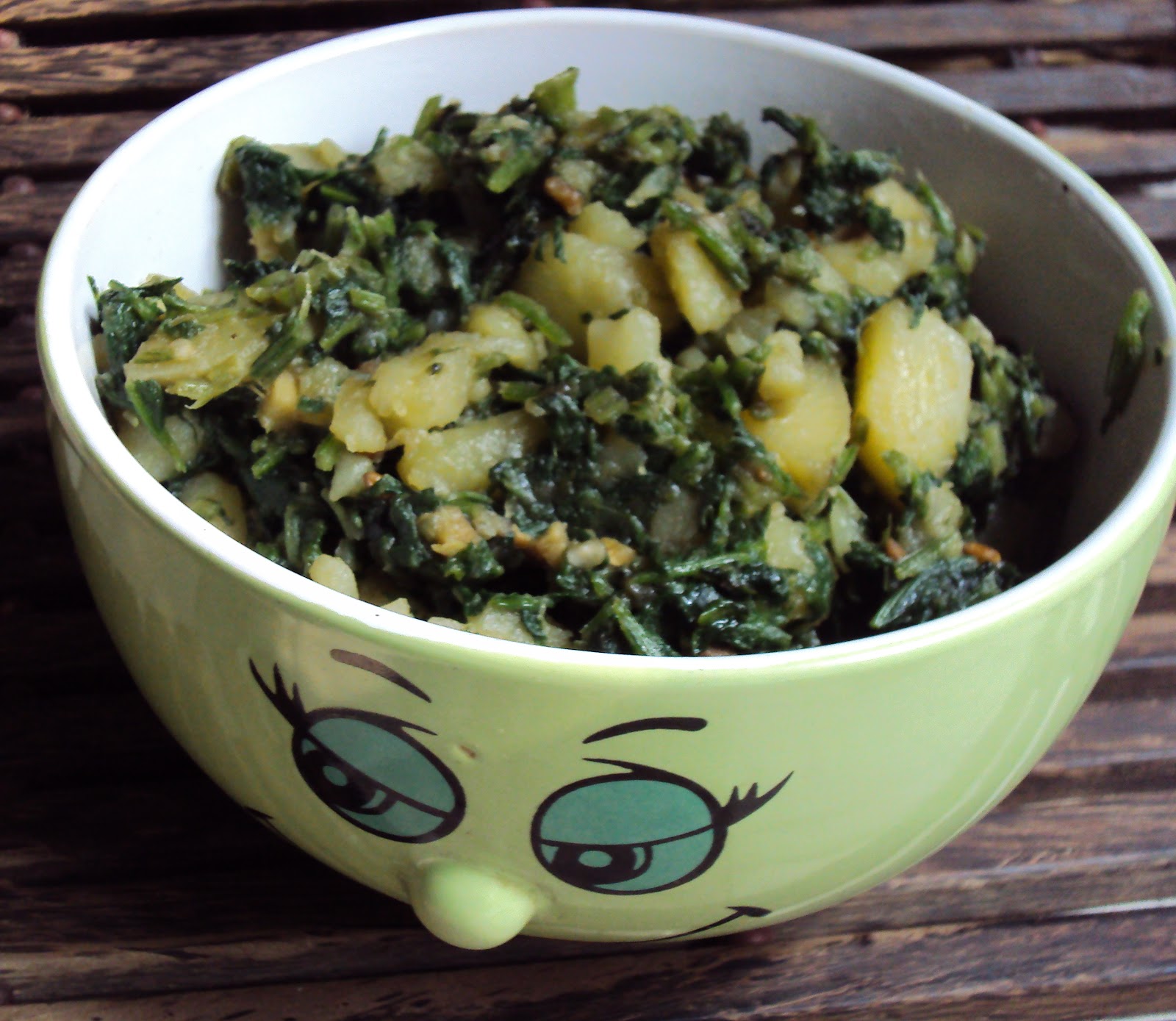 aloo saag ...spinach and new potatoes cooked to a mushy scramble...