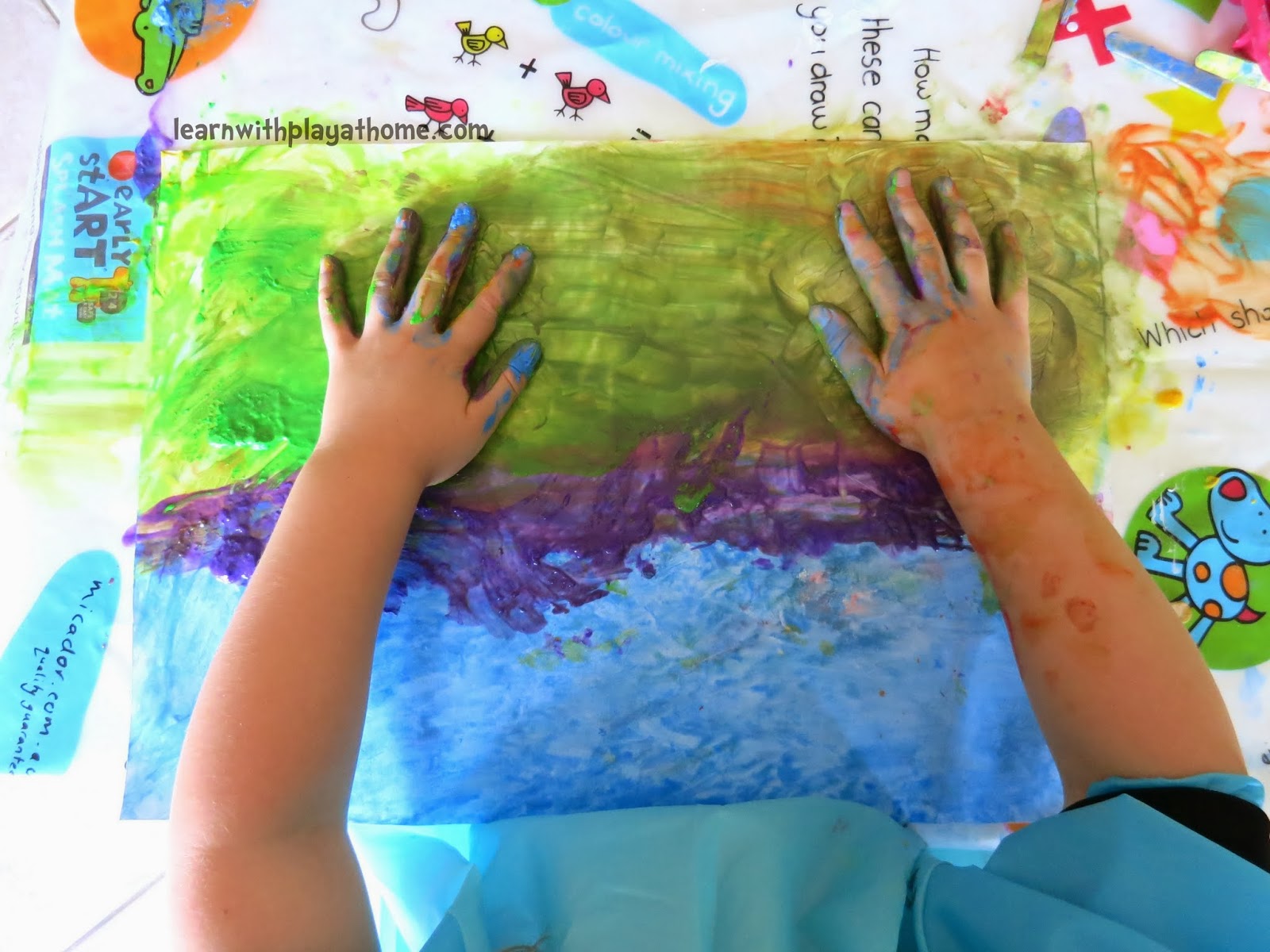 Learn with Play at Home: Paintsicles. Frozen paint cubes for creative fun.