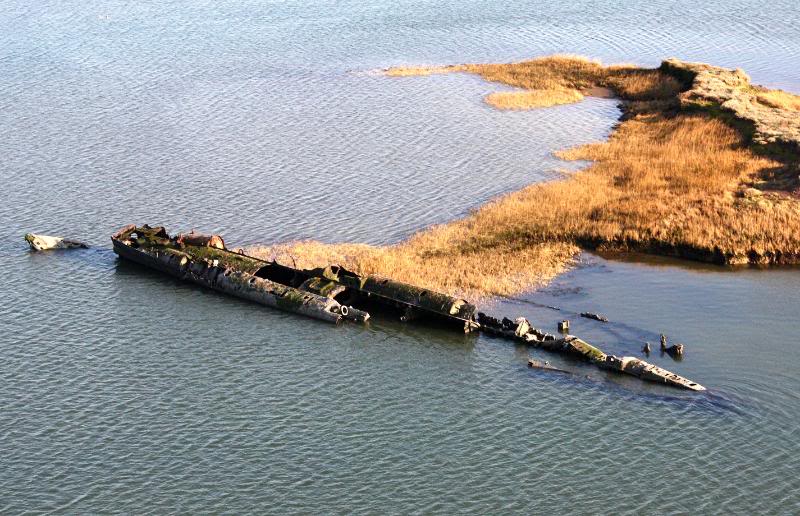 German World War I submarine exposed at low tide off the River Medway ...
