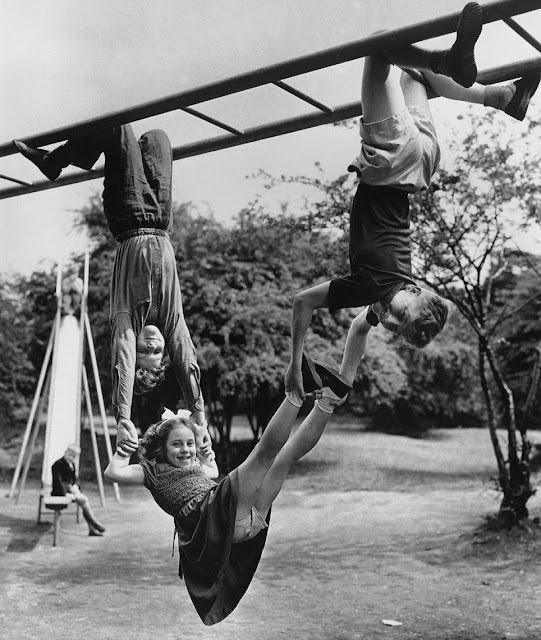 Two boys, a girl, and some monkey bars, 1954 ~ vintage everyday