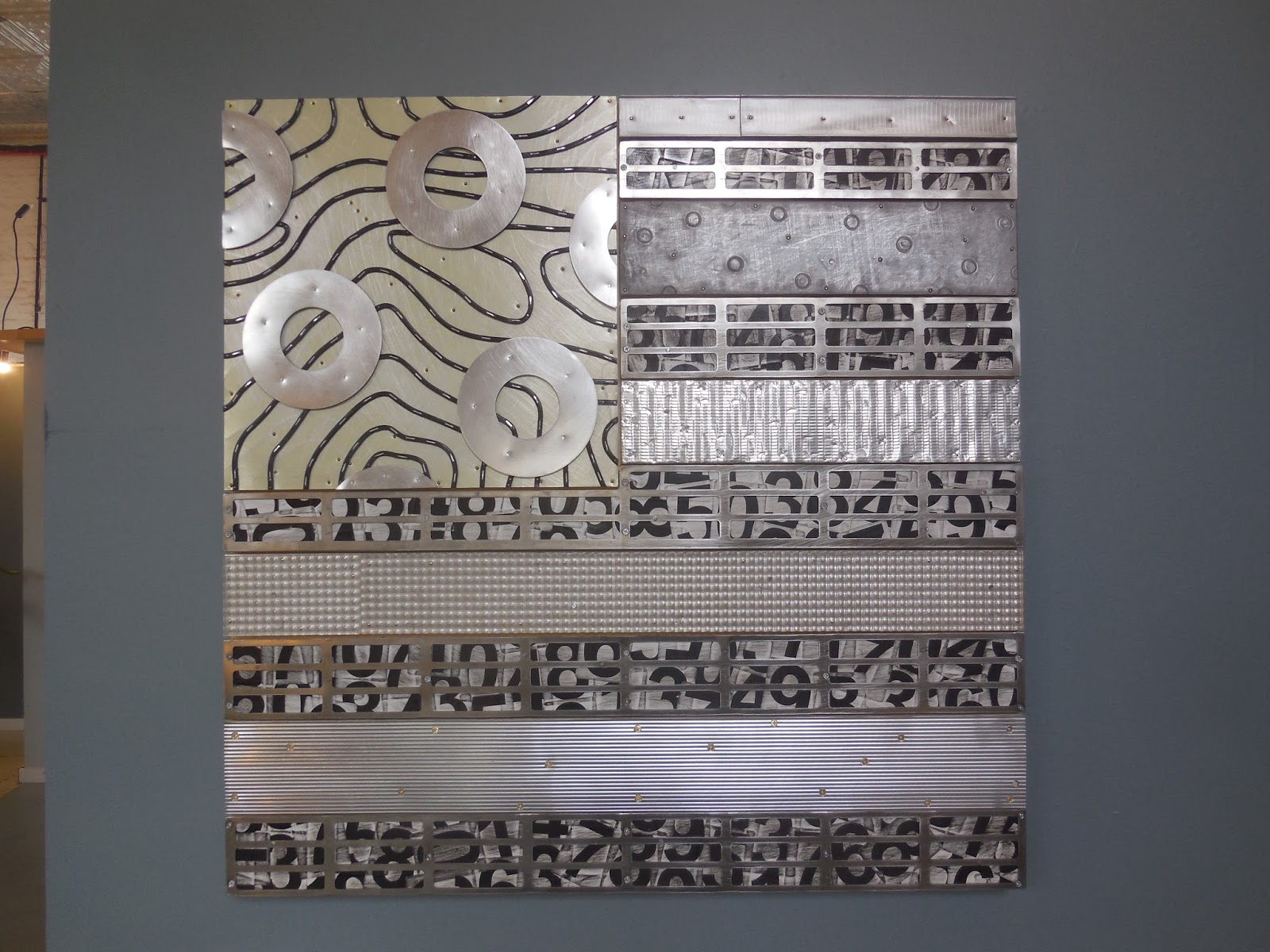 Art With a Needle: Flag art by Brad Devlin