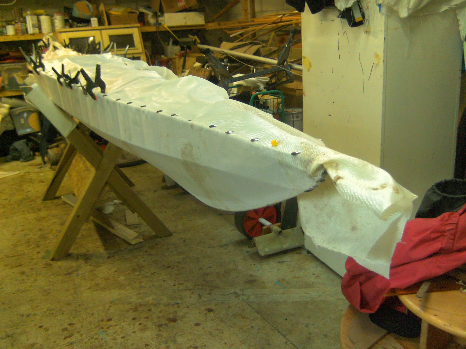 Sewing the skin on a frame kayak