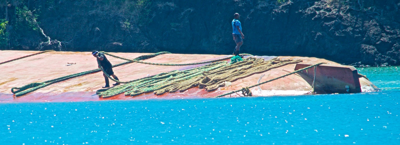 SAILING MOONSHADOW: Barge Salvage in Paradise