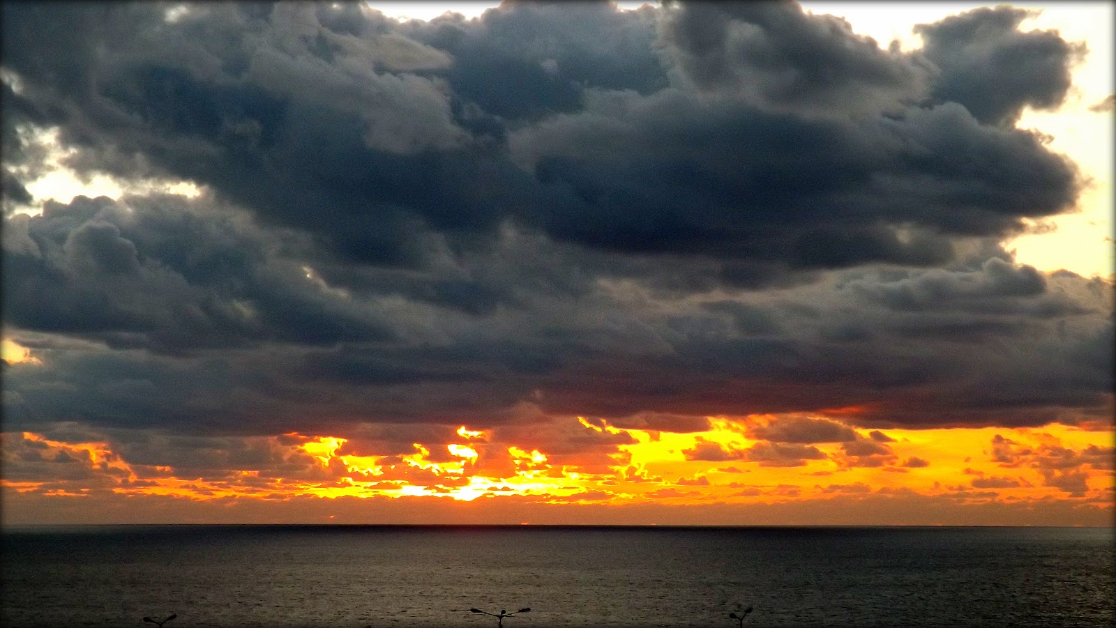 Sha'ar Ha-Aliyah שער העליה: Heavy Grey Clouds at Sunset