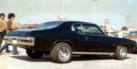 Just A Car Guy: Muscle cars in full effect, jacked in back with huge ...