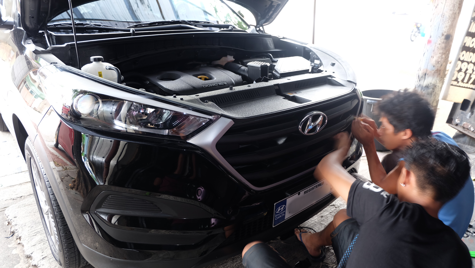 Road to stealthy look : Matte black vinyl wrap on Hyundai Tucson stock ...