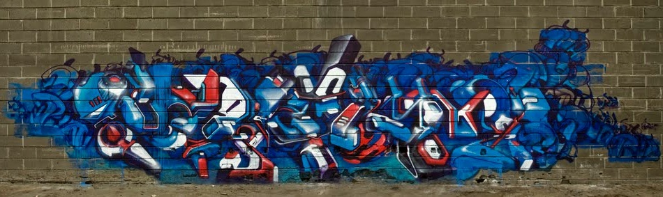 Blue Digital Graffiti Stack Letters in Wall | Digital Graffiti