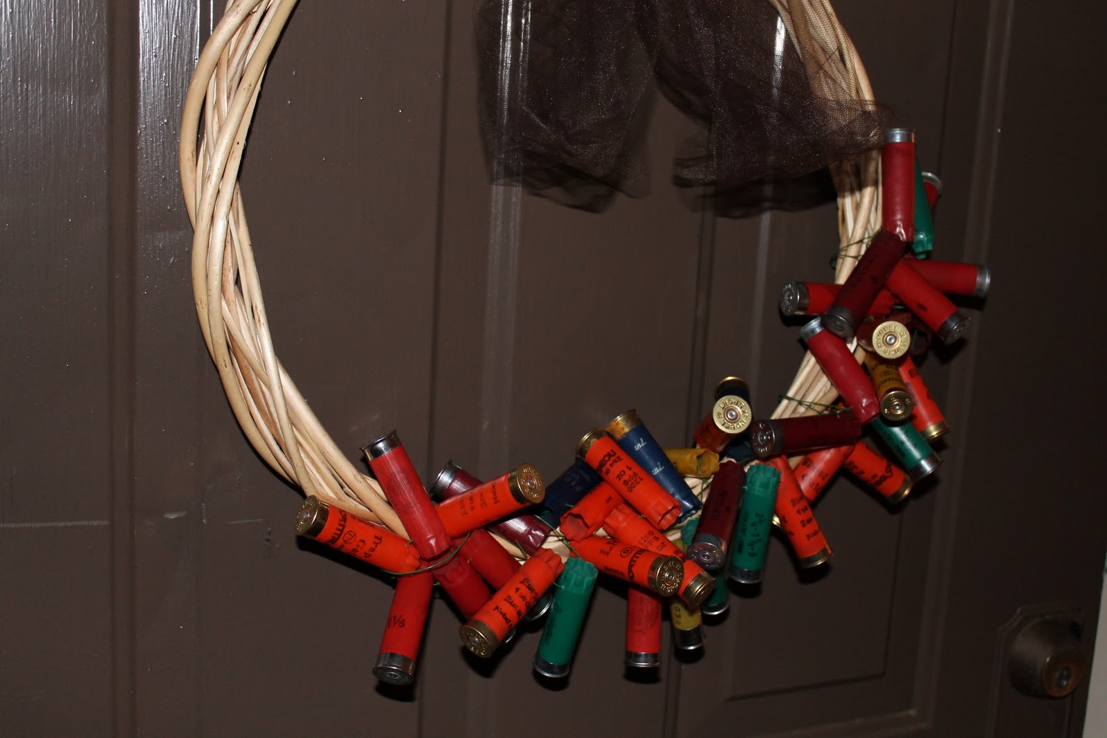 go ahead and make a bid on that: Shotgun Shell Wreath
