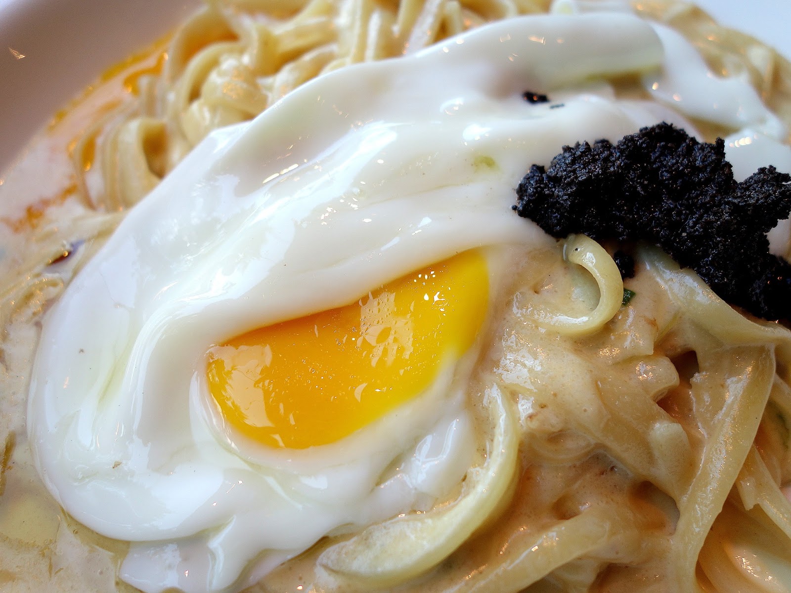 The menu's mouthwatering: Begin with linguine (RM28), tangled with ...