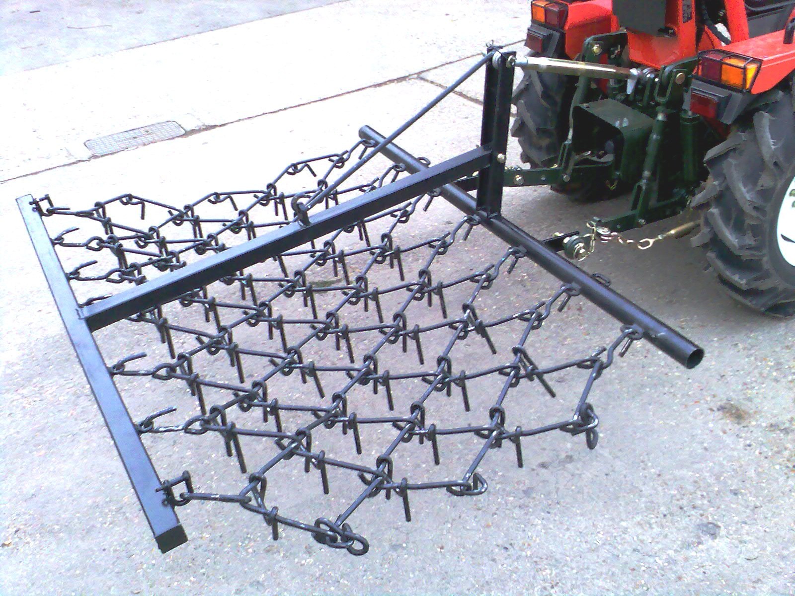 Compact Tractors and Machinery: What's the point in Chain Harrowing?