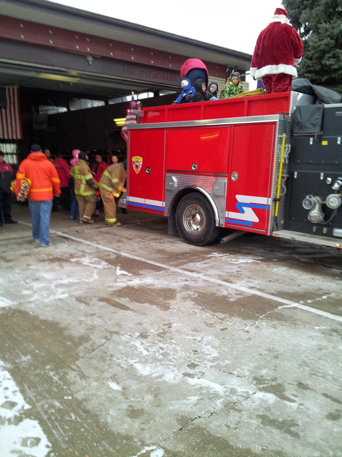 Petersen Family: Riding the Fire Truck with Santa