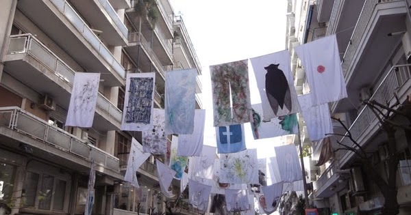 Textile Arts Now: Outdoor art installation with fabrics hanged like laundry