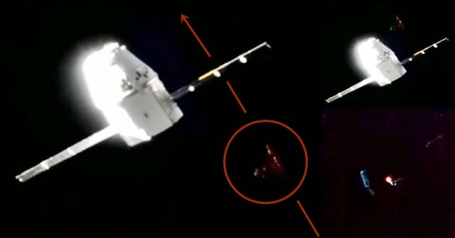 Triangular Craft filmed during docking procedure SpaceX Dragon Capsule ...