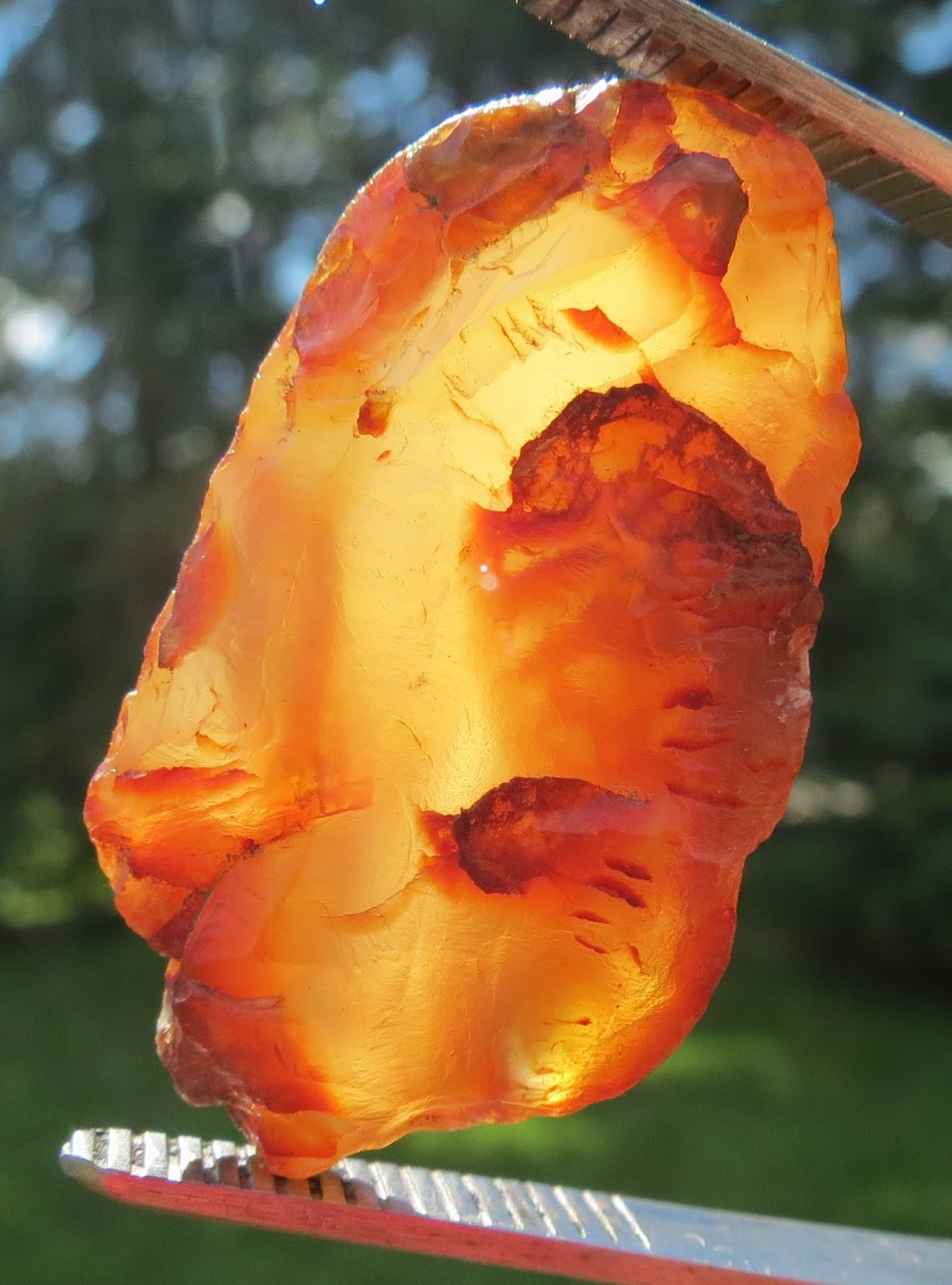 Archaeology of Portable Rock Art: Small translucent human head pebble ...