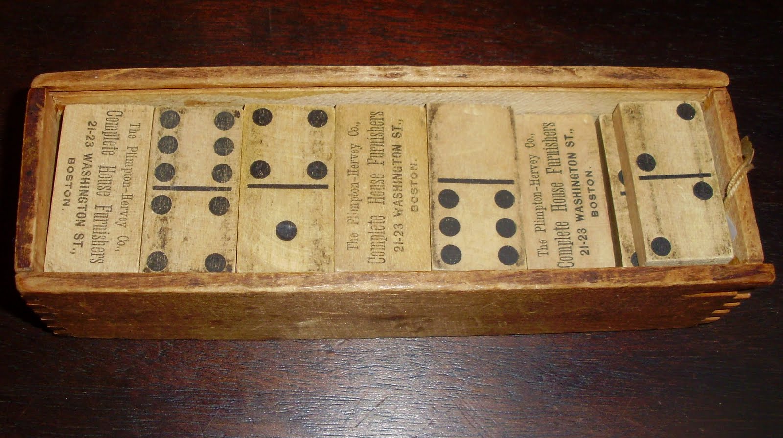 Log Cabin Antiques & Gifts: Wooden Dominoes with advertising