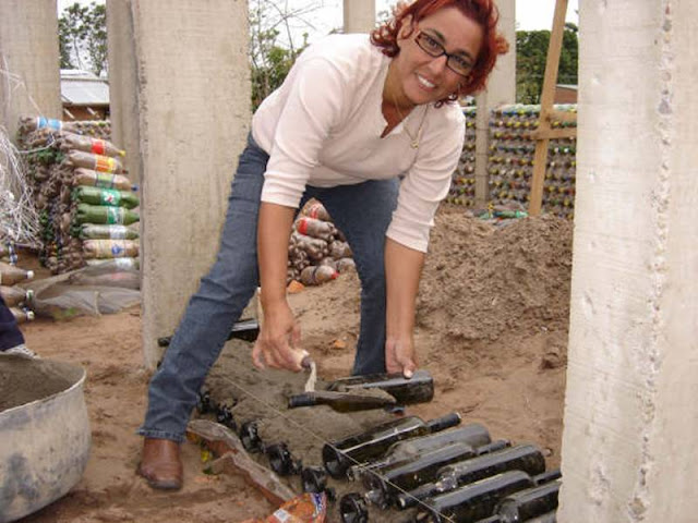 Get FuN Here: House made of Bottles