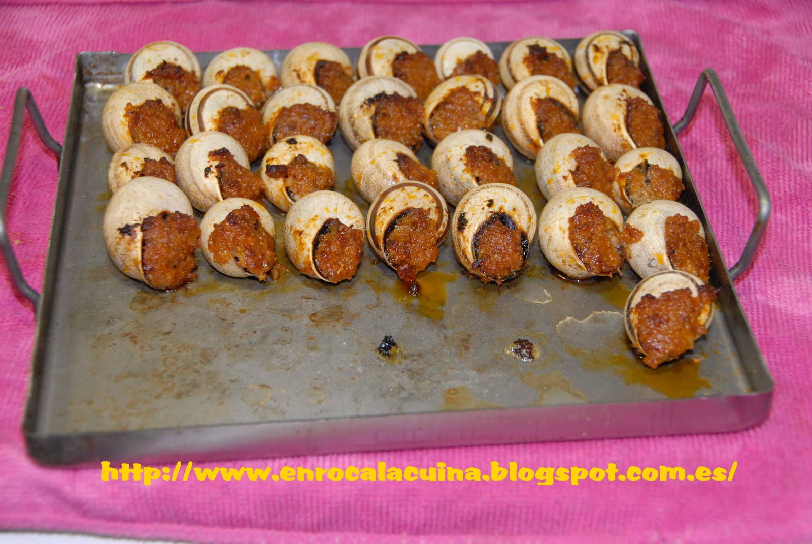 En Roc a la Cuina: Cargols a la llauna amb botifarra de pagès