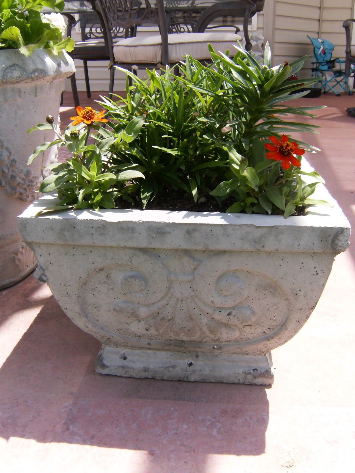 concrete yard decor: PLANTERS