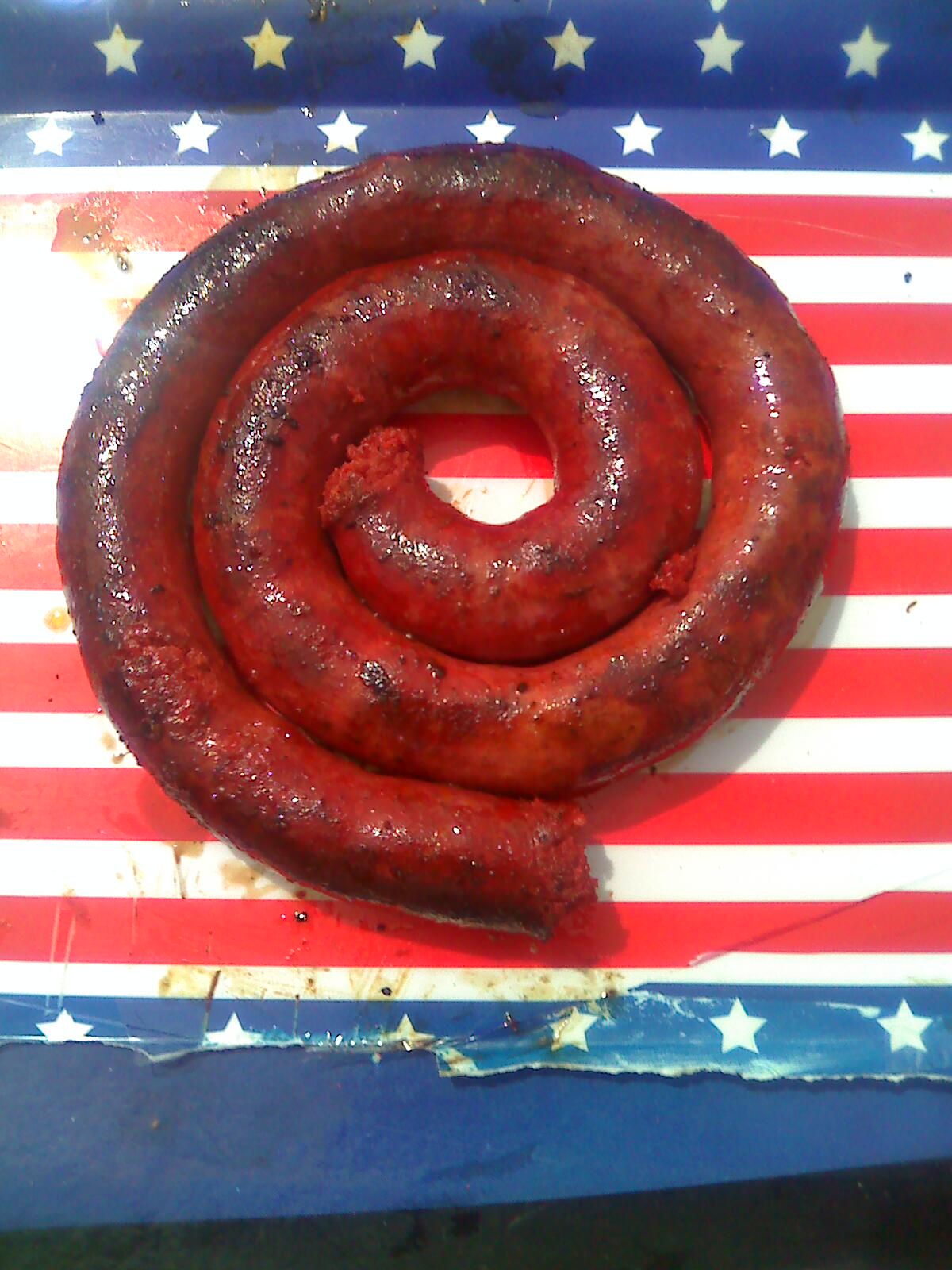 CHORIZO ASADO Y PIÑA ASADA A LA PARRILLA.