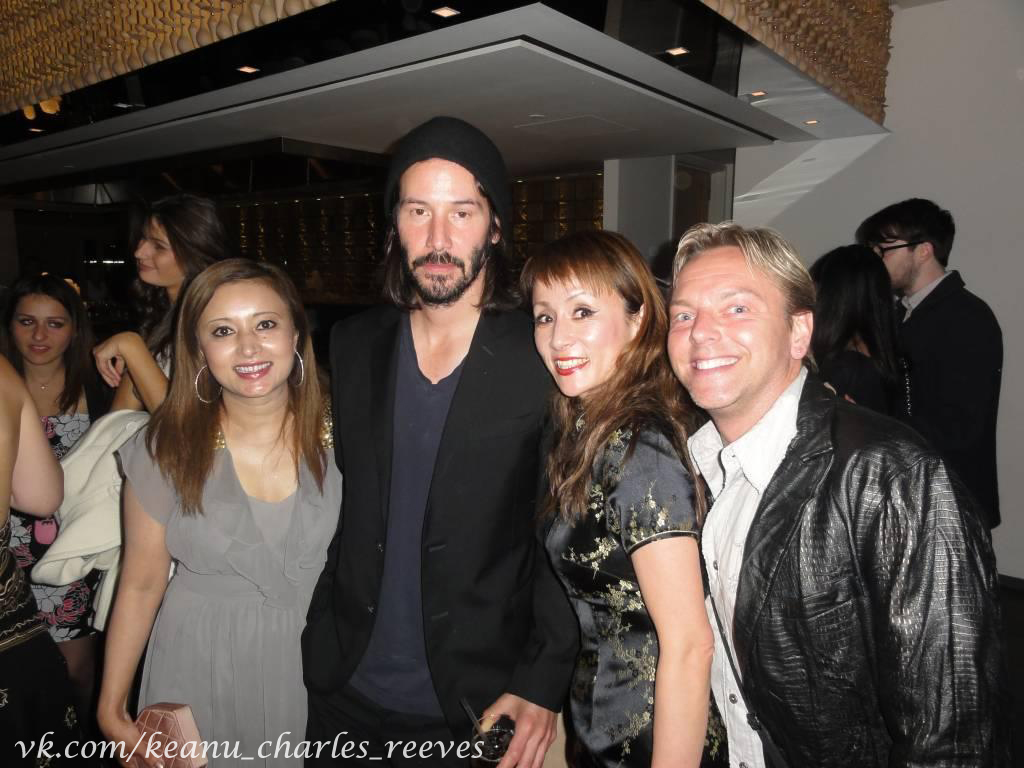 Keanu Reeves: Keanu Reeves with a group of fans at the party, London ...