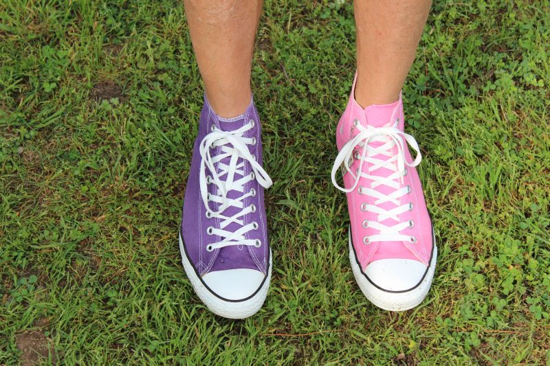 Colorful shoes, people, and a work of art