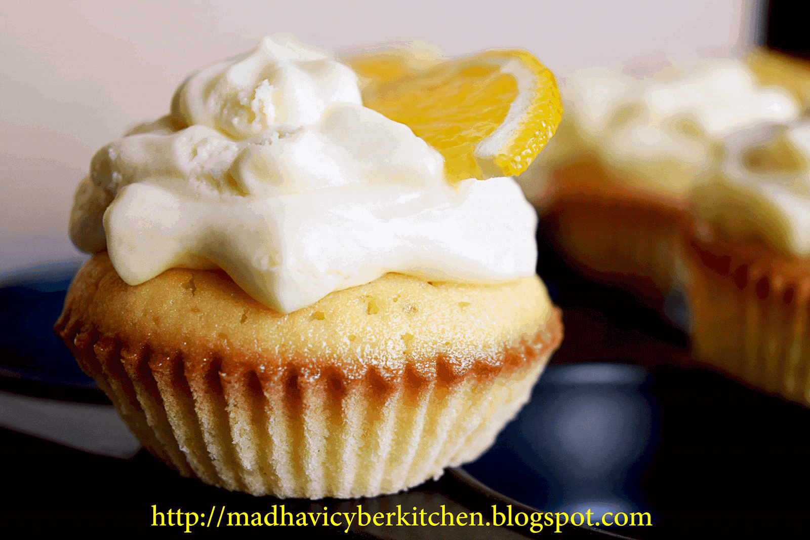 Madhavi's Cyber Kitchen: Orange cup cake with Orange cream frosting