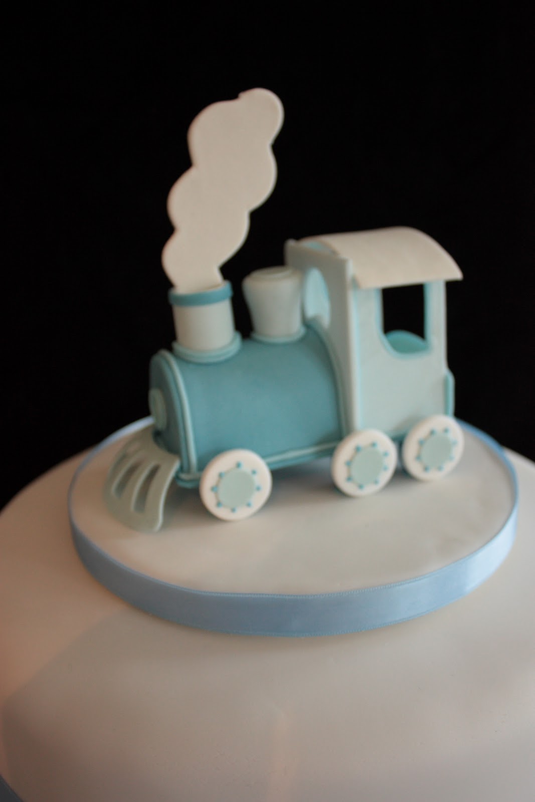 Vanilla: Christening cake with train topper