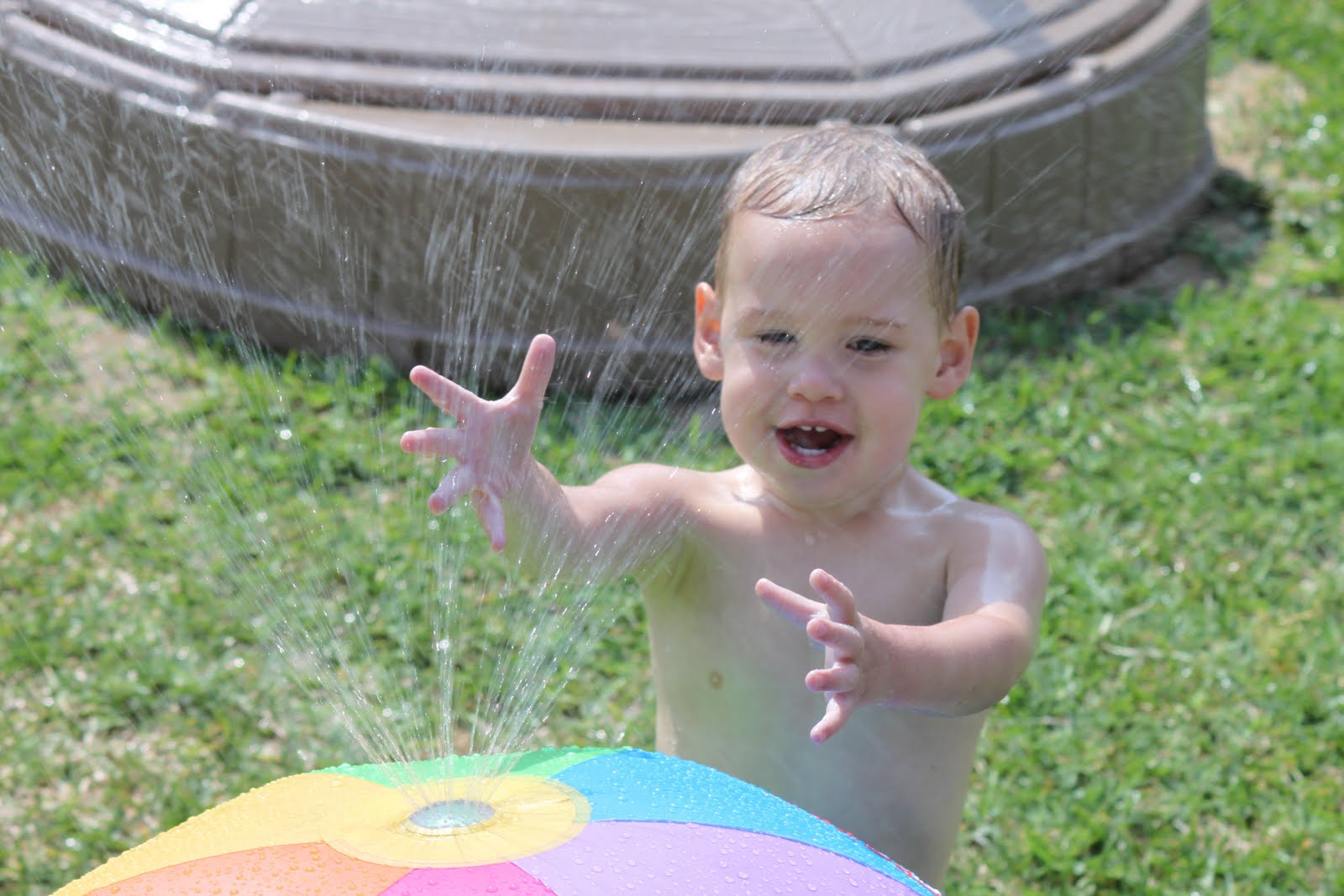 The Peacock Family: Water Sprinkler Fun