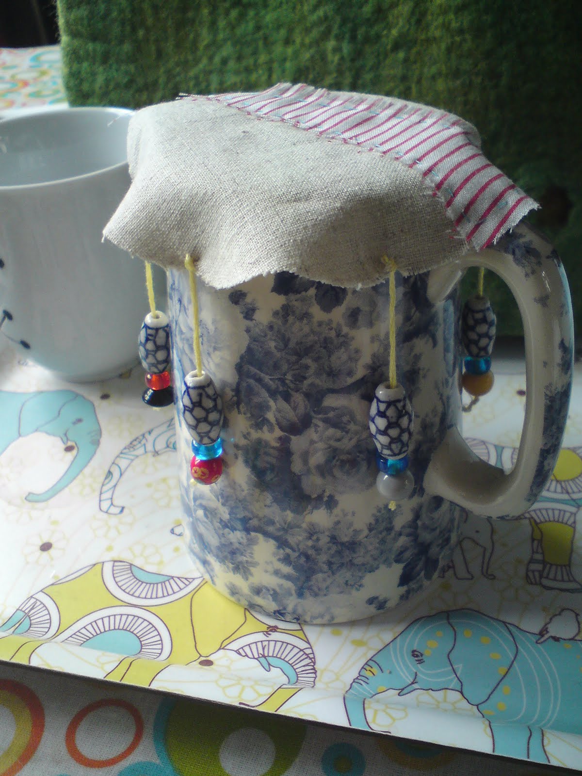 Felt Meets Cloth: Milk Jug Cover Done